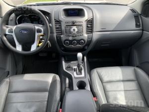 White Ford Ranger 2015 in Riga, with an engine capacity of 2.20 L and mileage of 252 thousand km for 13500 €, photo 11 on AUTOMOTO.COM.LV