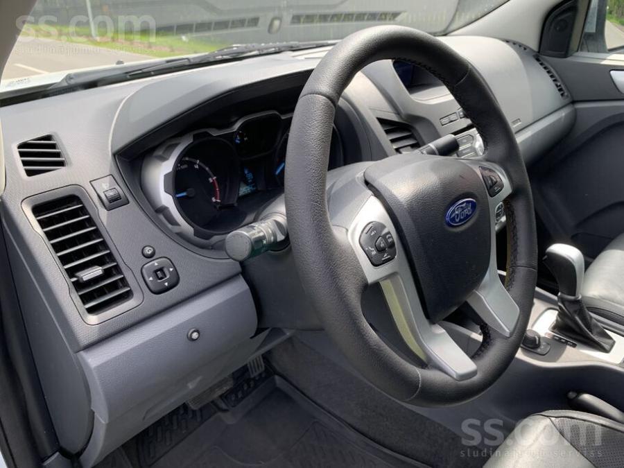 White Ford Ranger 2015 in Riga, with an engine capacity of 2.20 L and mileage of 252 thousand km for 13500 €, photo 13 on AUTOMOTO.COM.LV