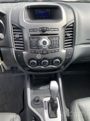 White Ford Ranger 2015 in Riga, with an engine capacity of 2.20 L and mileage of 252 thousand km for 13500 €, photo 14 on AUTOMOTO.COM.LV