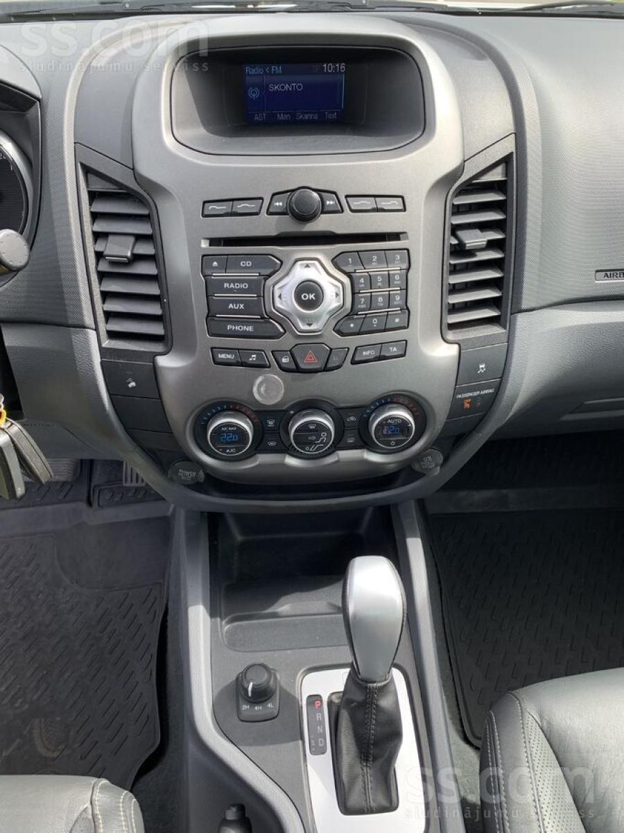 White Ford Ranger 2015 in Riga, with an engine capacity of 2.20 L and mileage of 252 thousand km for 13500 €, photo 14 on AUTOMOTO.COM.LV