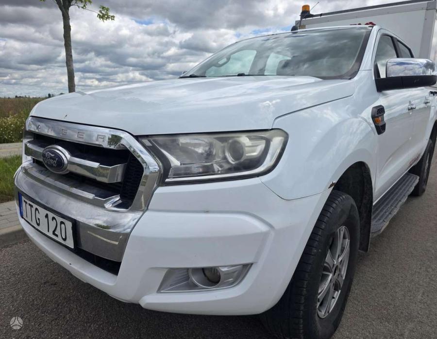 White Ford Ranger 2016 in Marijampole, with an engine capacity of 2.20 L and mileage of 289 thousand km for 8950 €, photo 2 on AUTOMOTO.COM.LV