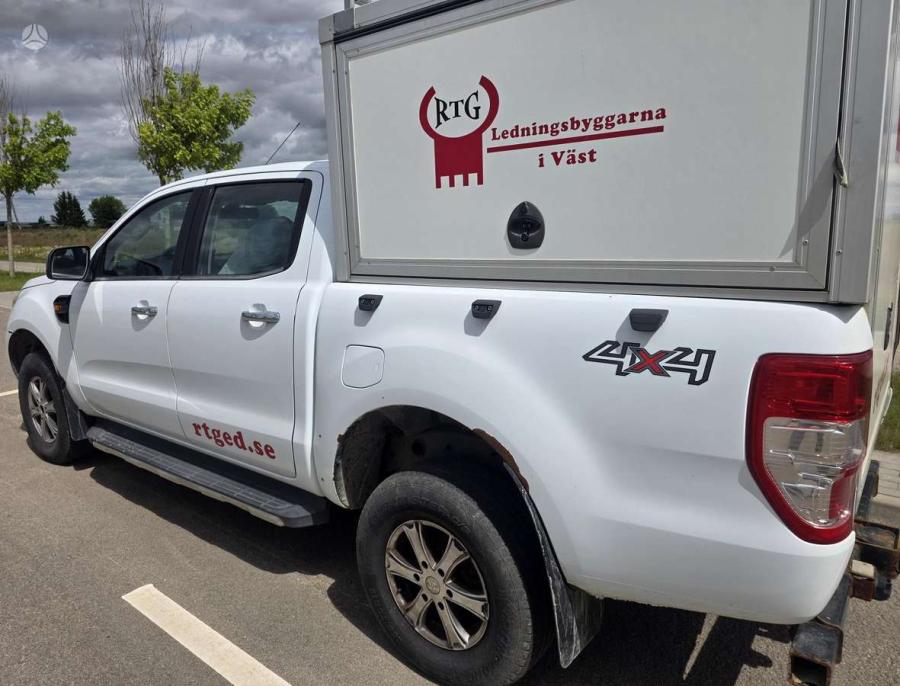 White Ford Ranger 2016 in Marijampole, with an engine capacity of 2.20 L and mileage of 289 thousand km for 8950 €, photo 7 on AUTOMOTO.COM.LV