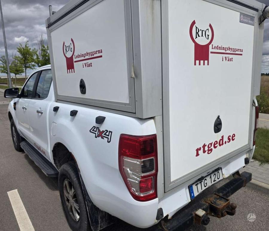 White Ford Ranger 2016 in Marijampole, with an engine capacity of 2.20 L and mileage of 289 thousand km for 8950 €, photo 9 on AUTOMOTO.COM.LV