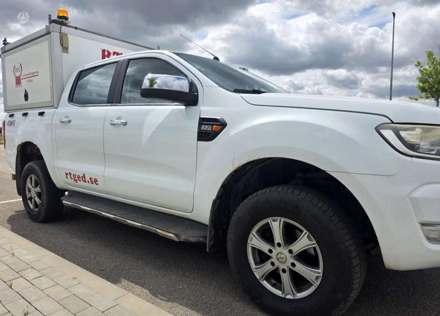 White Ford Ranger 2016 in Marijampole, with an engine capacity of 2.20 L and mileage of 289 thousand km for 8950 €, photo 12 on AUTOMOTO.COM.LV