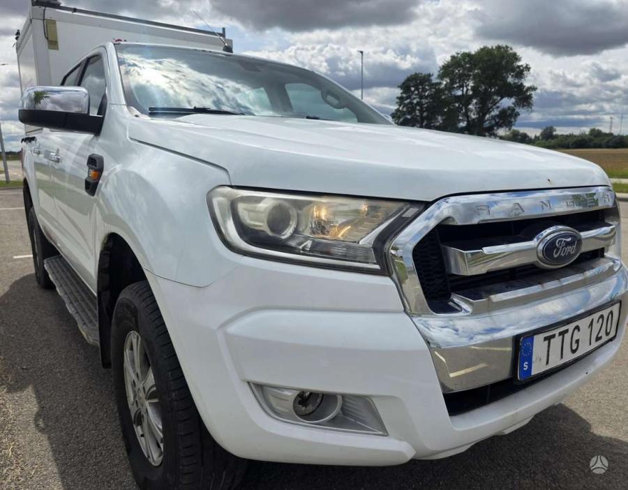 White Ford Ranger 2016 in Marijampole, with an engine capacity of 2.20 L and mileage of 289 thousand km for 8950 €, photo 15 on AUTOMOTO.COM.LV