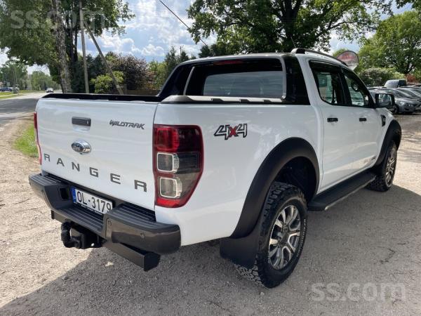 White Ford Ranger 2018 in Riga, with an engine capacity of 3.20 L and mileage of 142 thousand km for 24500 €, photo 7 on AUTOMOTO.COM.LV