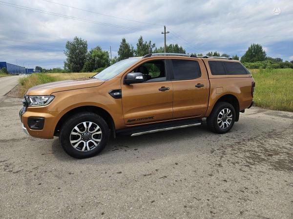 Yellow Ford Ranger 2019 in Taurage, with an engine capacity of 3.20 L and mileage of 201 thousand km for 16200 €, photo 1 on AUTOMOTO.COM.LV