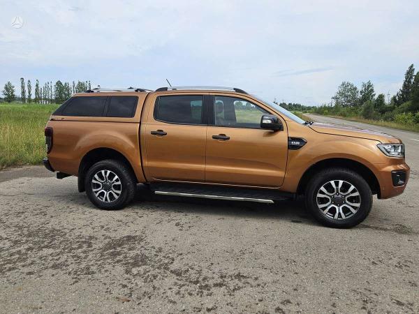 Yellow Ford Ranger 2019 in Taurage, with an engine capacity of 3.20 L and mileage of 201 thousand km for 16200 €, photo 3 on AUTOMOTO.COM.LV