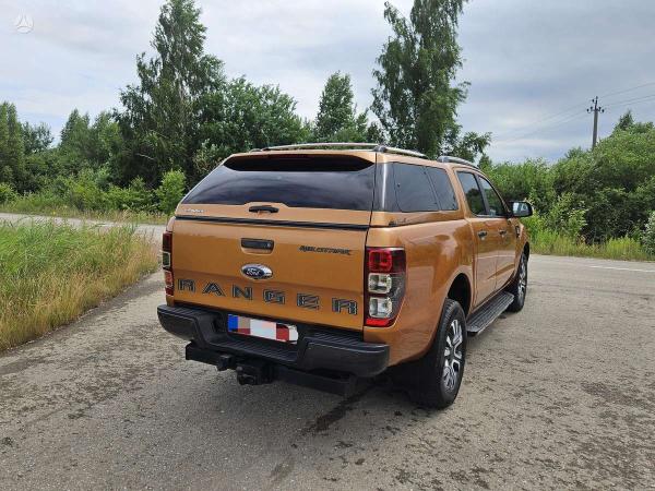 Yellow Ford Ranger 2019 in Taurage, with an engine capacity of 3.20 L and mileage of 201 thousand km for 16200 €, photo 5 on AUTOMOTO.COM.LV