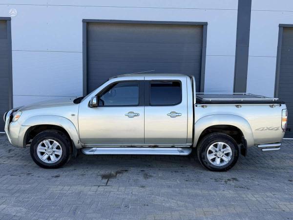 Yellow Ford Ranger 2009 in Vilnius, with an engine capacity of 2.50 L and mileage of 309 thousand km for 3850 €, photo 2 on AUTOMOTO.COM.LV
