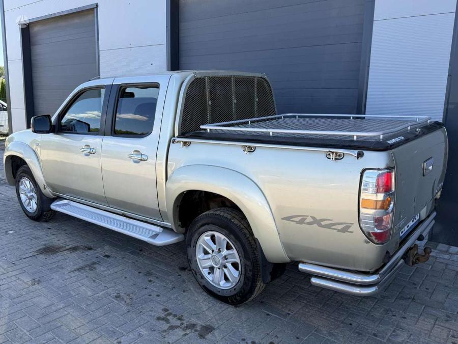 Yellow Ford Ranger 2009 in Vilnius, with an engine capacity of 2.50 L and mileage of 309 thousand km for 3850 €, photo 4 on AUTOMOTO.COM.LV