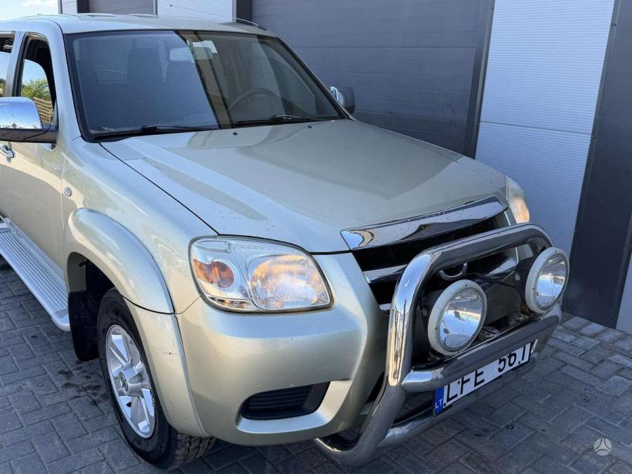 Yellow Ford Ranger 2009 in Vilnius, with an engine capacity of 2.50 L and mileage of 309 thousand km for 3850 €, photo 5 on AUTOMOTO.COM.LV
