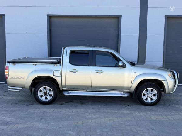 Yellow Ford Ranger 2009 in Vilnius, with an engine capacity of 2.50 L and mileage of 309 thousand km for 3850 €, photo 6 on AUTOMOTO.COM.LV