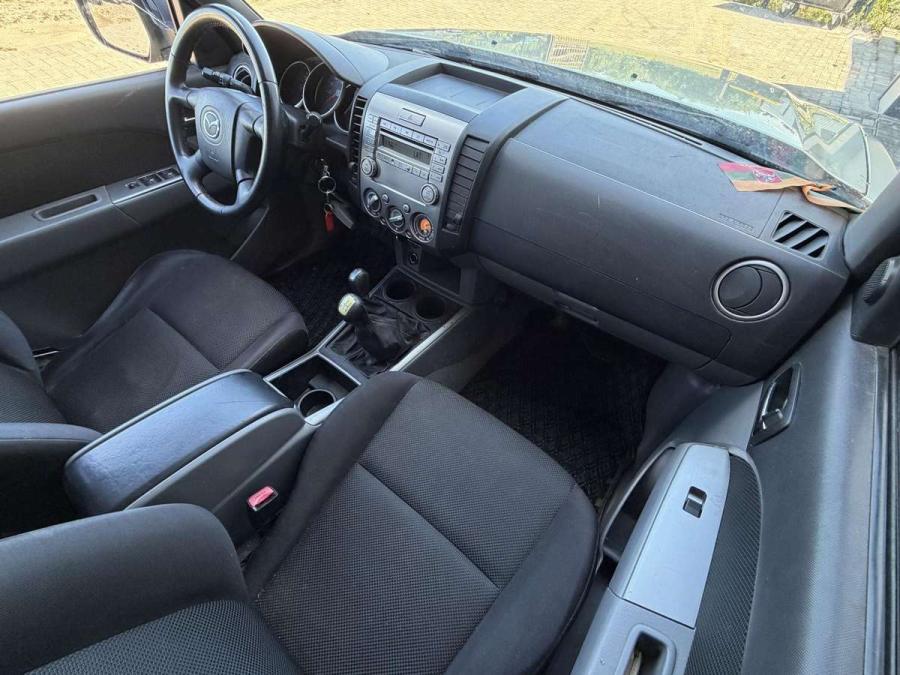 Yellow Ford Ranger 2009 in Vilnius, with an engine capacity of 2.50 L and mileage of 309 thousand km for 3850 €, photo 18 on AUTOMOTO.COM.LV