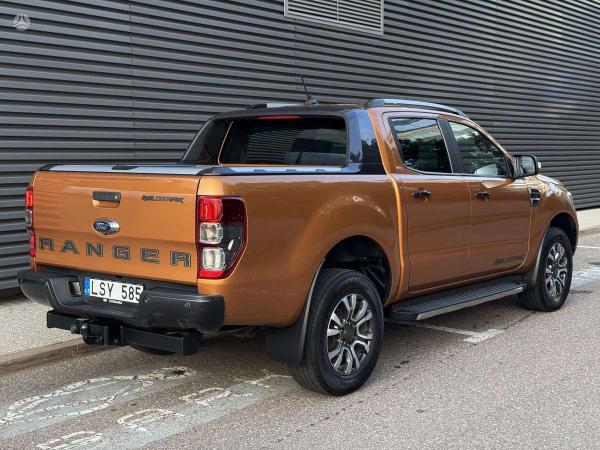 Yellow Ford Ranger 2021 in Vilnius, with an engine capacity of 2.00 L and mileage of 170 thousand km for 19990 €, photo 3 on AUTOMOTO.COM.LV