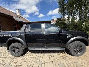 Black Ford Raptor 2023 in Riga, with an engine capacity of 2.00 L and mileage of 92 thousand km for 40000 €, photo 6 on AUTOMOTO.COM.LV