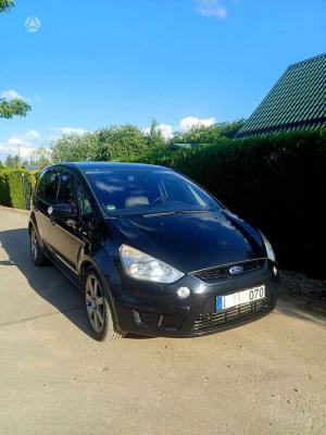 Black Ford S-Max 2009 in Vilnius, with an engine capacity of 2.18 L and mileage of 294 thousand km for 3100 €, photo 12 on AUTOMOTO.COM.LV
