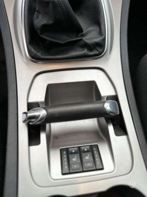Black Ford S-Max 2011 in Kaunas, with an engine capacity of 2.00 L and mileage of 392 thousand km for 3699 €, photo 23 on AUTOMOTO.COM.LV