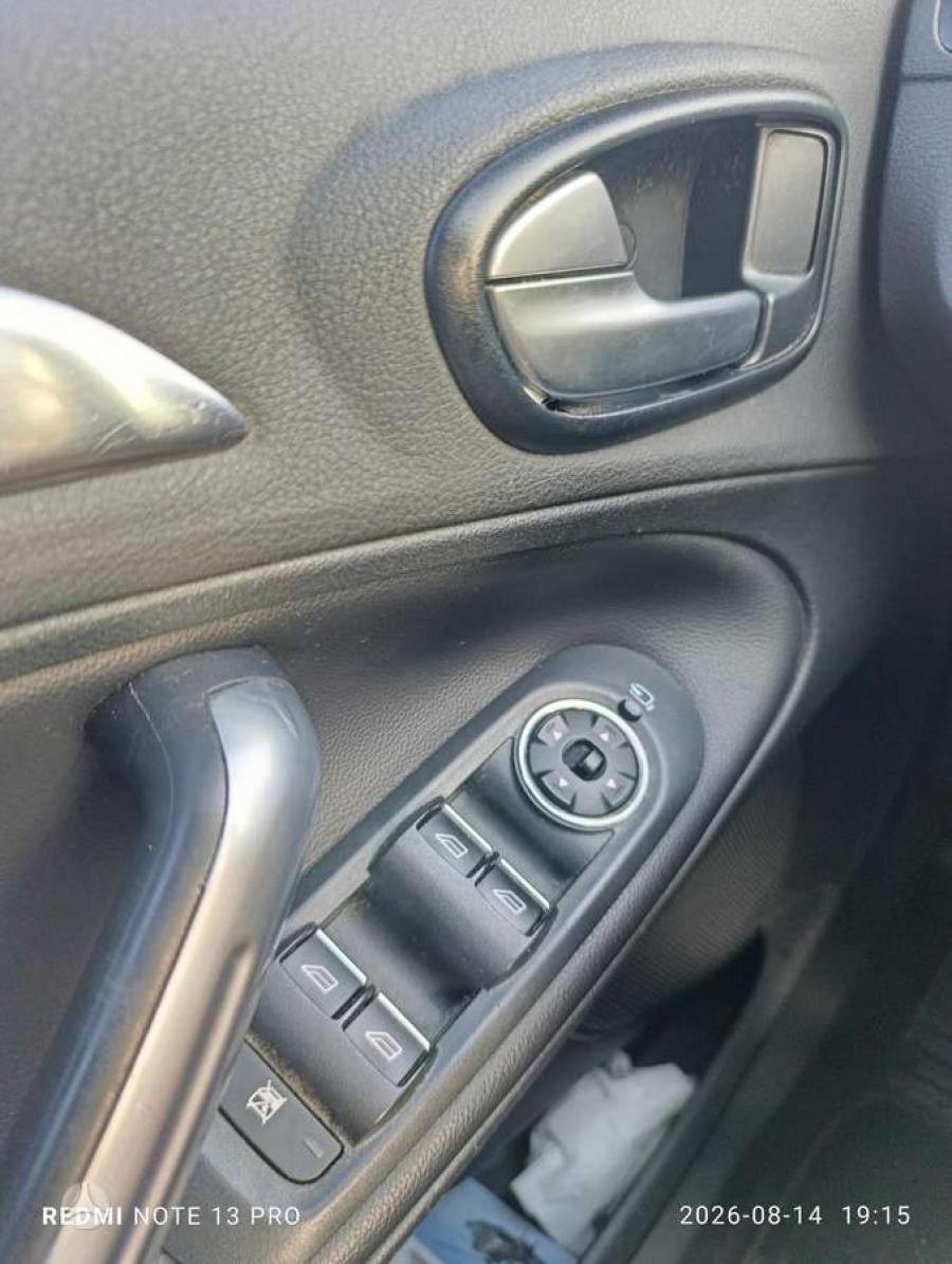 Grey Ford S-Max 2009 in Alytus, with an engine capacity of 2.18 L and mileage of 300 thousand km for 3150 €, photo 12 on AUTOMOTO.COM.LV