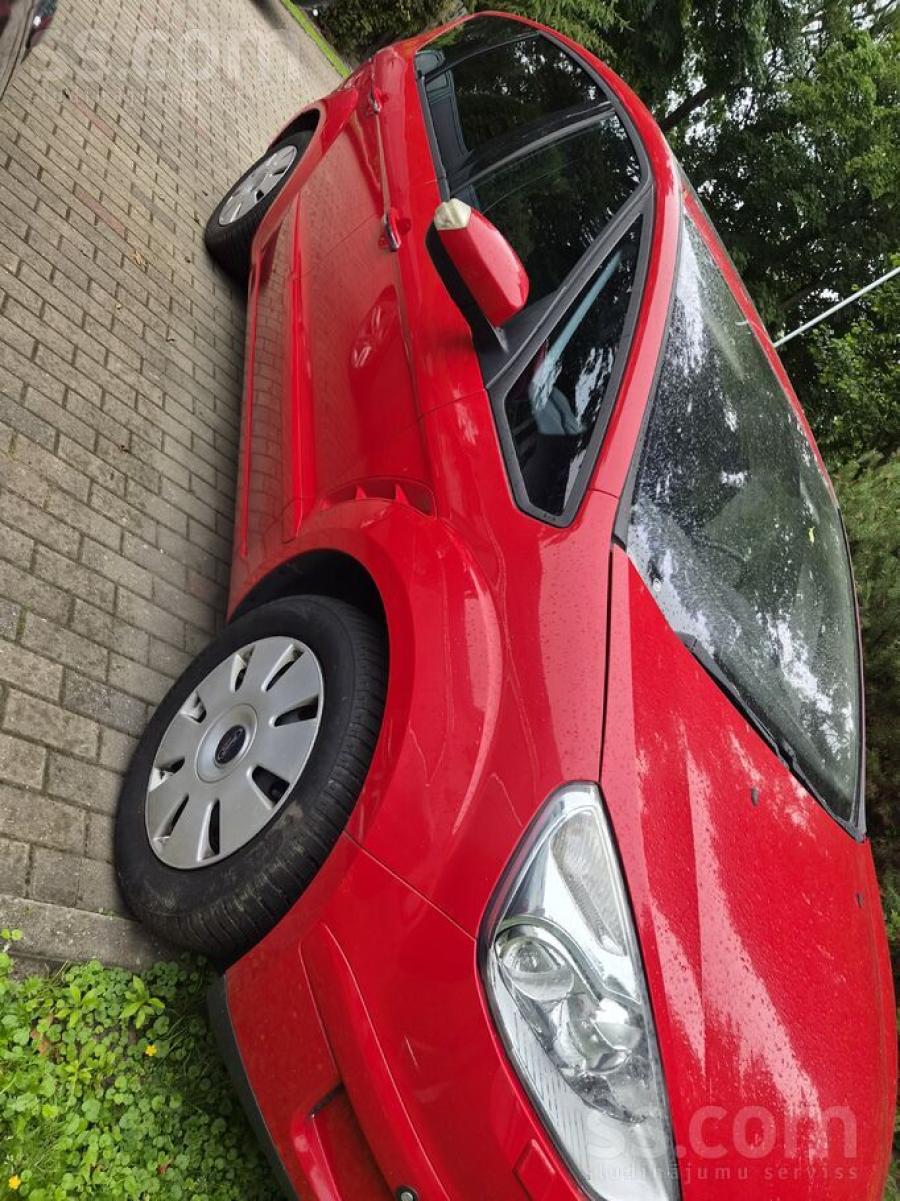 Red Ford S-Max 2009 in Riga, with an engine capacity of 2.20 L and mileage of 240 thousand km for 3790 €, photo 5 on AUTOMOTO.COM.LV