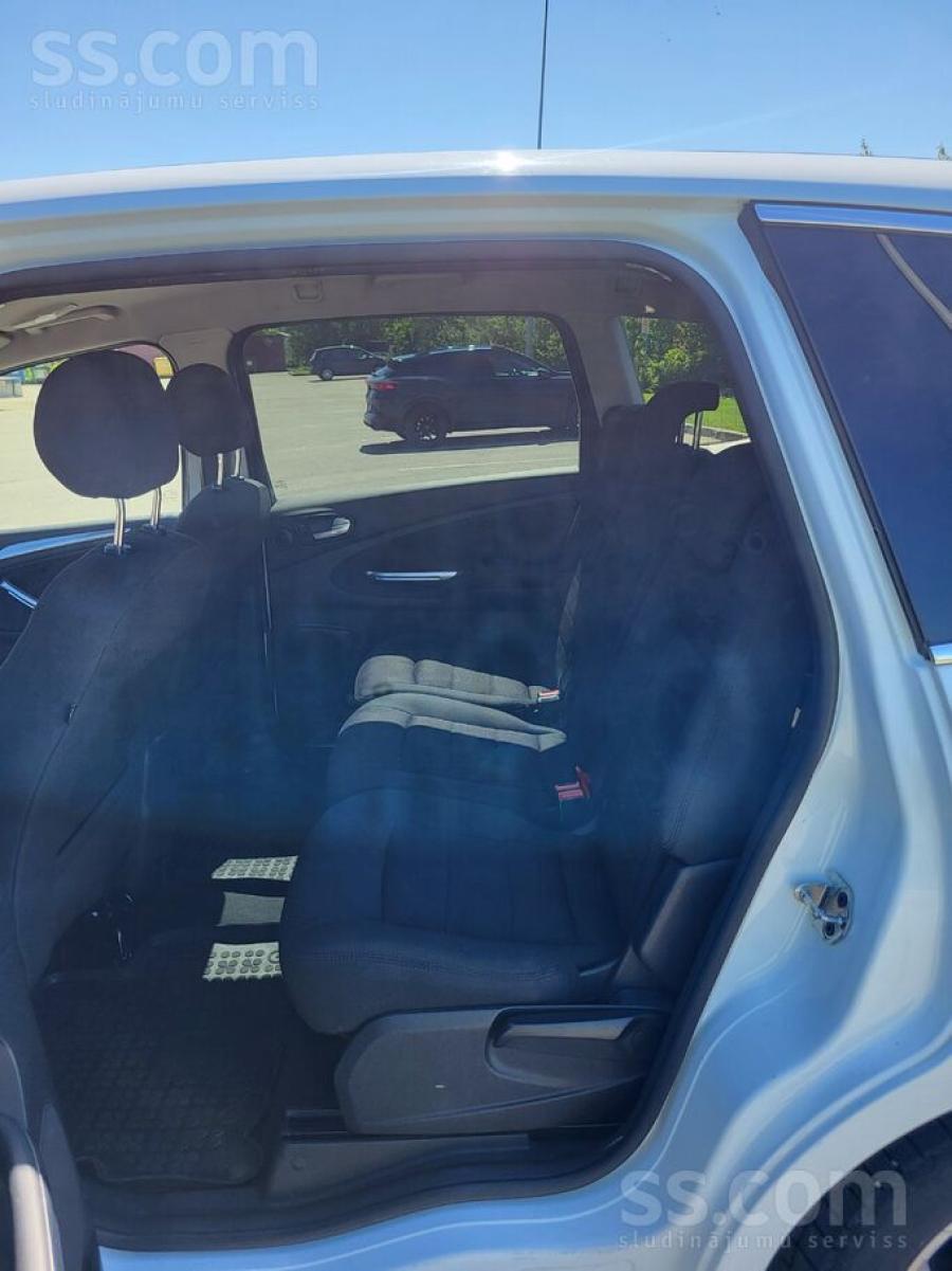 White Ford S-Max 2014 in Riga, with an engine capacity of 2.00 L and mileage of 235 thousand km for 4800 €, photo 7 on AUTOMOTO.COM.LV