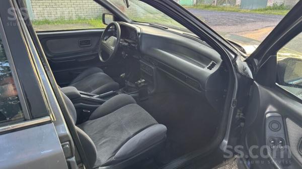 Blue Ford Scorpio 1990 in Riga, with an engine capacity of 2.00 L and mileage of 291 thousand km for 2500 €, photo 8 on AUTOMOTO.COM.LV