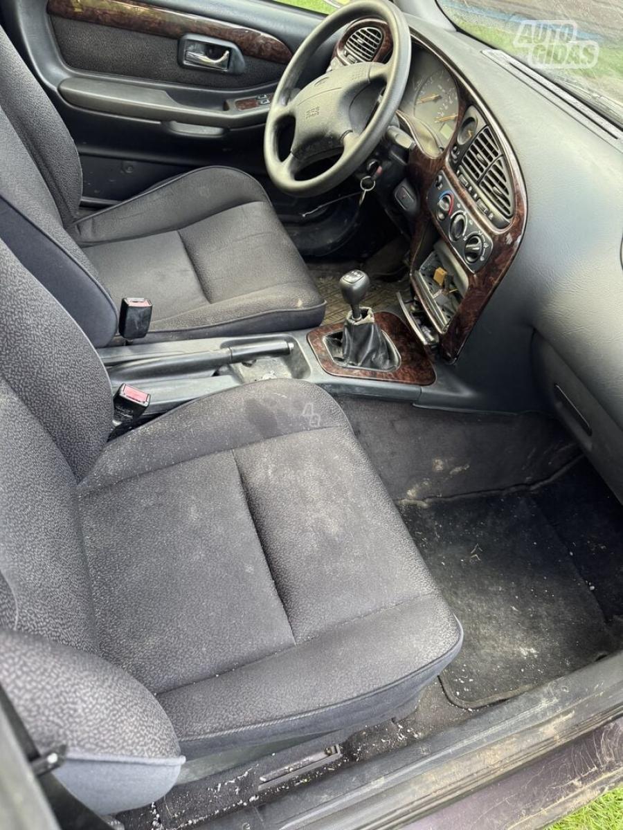 Ford Scorpio 1994 in Panevezys, with an engine capacity of 2.50 L and mileage of 300 thousand km for 450 €, photo 6 on AUTOMOTO.COM.LV