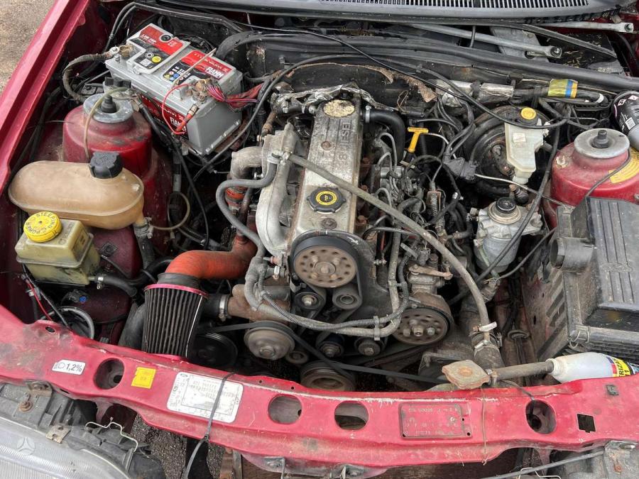 Red Ford Sierra 1994 in Sirvintos, with an engine capacity of 1.75 L and mileage of 30 thousand km for 350 €, photo 7 on AUTOMOTO.COM.LV