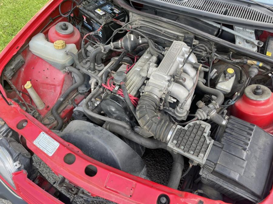 Red Ford Sierra 1991 in Tallinn, with an engine capacity of 2.00 L and mileage of 102 thousand km for 4000 €, photo 26 on AUTOMOTO.COM.LV