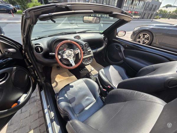 Black Ford Streetka 2003 in Vilnius, with an engine capacity of 1.60 L and mileage of 145 thousand km for 2900 €, photo 5 on AUTOMOTO.COM.LV