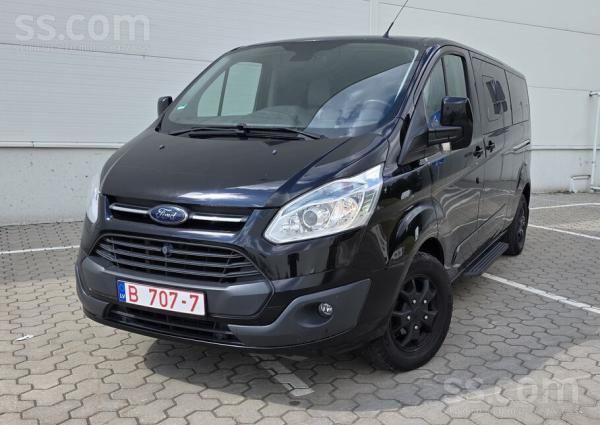 Black Ford Tourneo 2013 in Riga, with an engine capacity of 2.20 L and mileage of 218 thousand km for 12900 €, photo 1 on AUTOMOTO.COM.LV