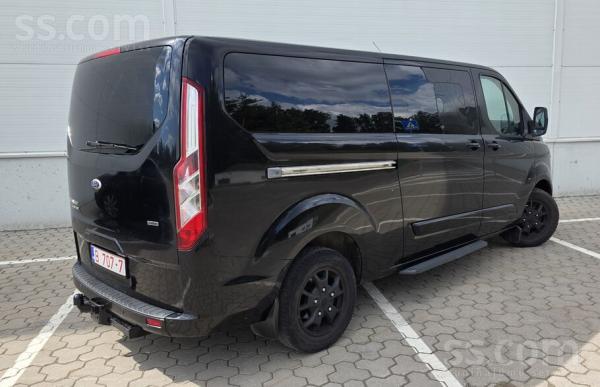 Black Ford Tourneo 2013 in Riga, with an engine capacity of 2.20 L and mileage of 218 thousand km for 12900 €, photo 5 on AUTOMOTO.COM.LV