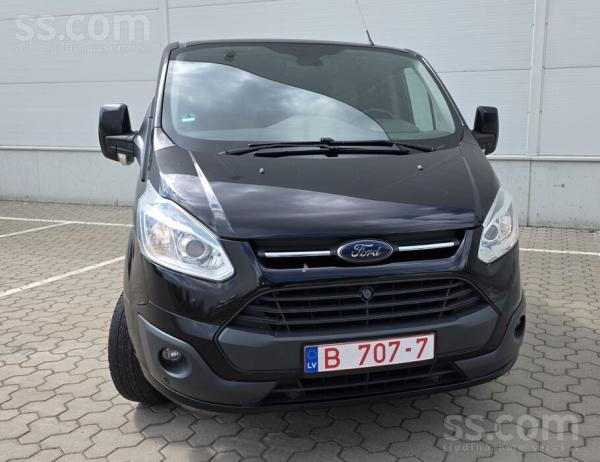 Black Ford Tourneo 2013 in Riga, with an engine capacity of 2.20 L and mileage of 218 thousand km for 12900 €, photo 8 on AUTOMOTO.COM.LV