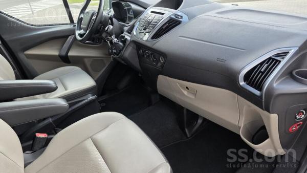 Black Ford Tourneo 2013 in Riga, with an engine capacity of 2.20 L and mileage of 218 thousand km for 12900 €, photo 10 on AUTOMOTO.COM.LV