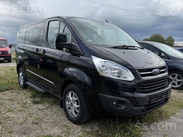 Black Ford Tourneo 2013 in Jelgava, with an engine capacity of 2.20 L and mileage of 220 thousand km for 12900 €, photo 2 on AUTOMOTO.COM.LV