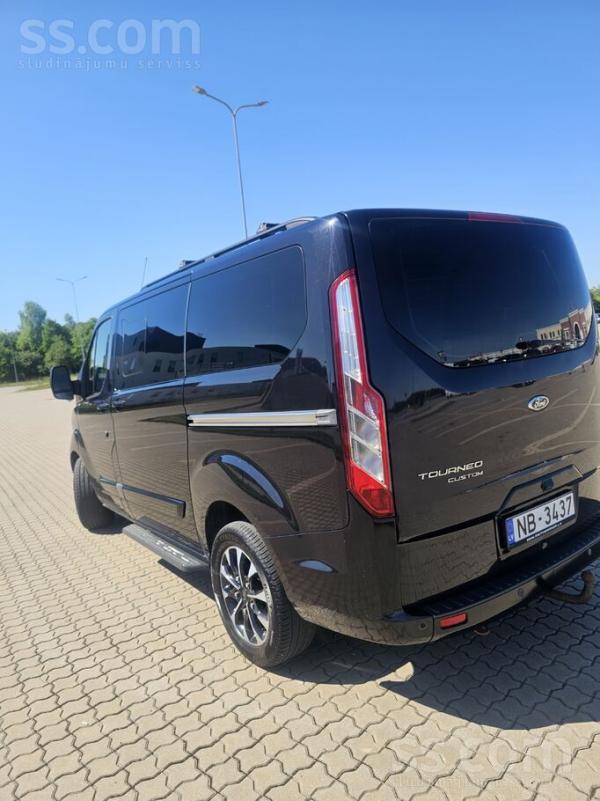 Black Ford Tourneo 2014 in Riga, with an engine capacity of 2.20 L and mileage of 310 thousand km for 12000 €, photo 3 on AUTOMOTO.COM.LV