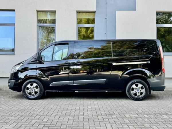 Black Ford Tourneo 2018 in Riga, with an engine capacity of 2.00 L and mileage of 166 thousand km for 19700 €, photo 4 on AUTOMOTO.COM.LV