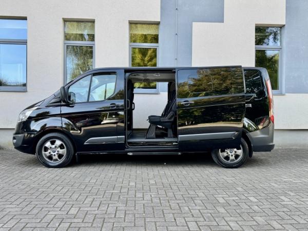 Black Ford Tourneo 2018 in Riga, with an engine capacity of 2.00 L and mileage of 166 thousand km for 19700 €, photo 6 on AUTOMOTO.COM.LV