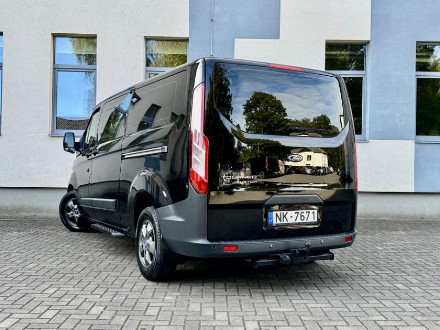 Black Ford Tourneo 2018 in Riga, with an engine capacity of 2.00 L and mileage of 166 thousand km for 19700 €, photo 9 on AUTOMOTO.COM.LV