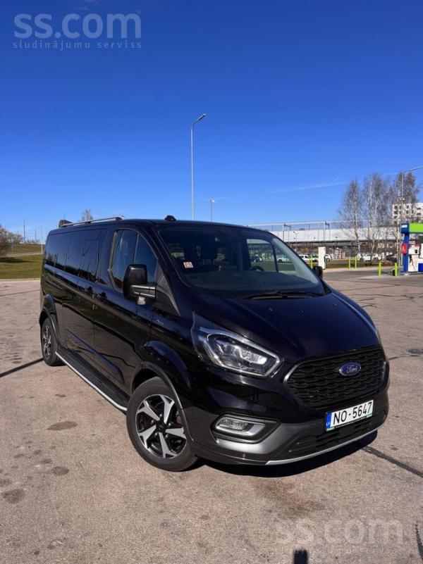 Black Ford Tourneo 2023 in Riga, with an engine capacity of 2.00 L and mileage of 124 thousand km for 35000 €, photo 2 on AUTOMOTO.COM.LV
