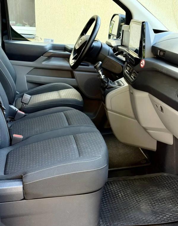 Black Ford Tourneo 2024 in Riga, with an engine capacity of 2.00 L and mileage of 39 thousand km for 38000 €, photo 8 on AUTOMOTO.COM.LV