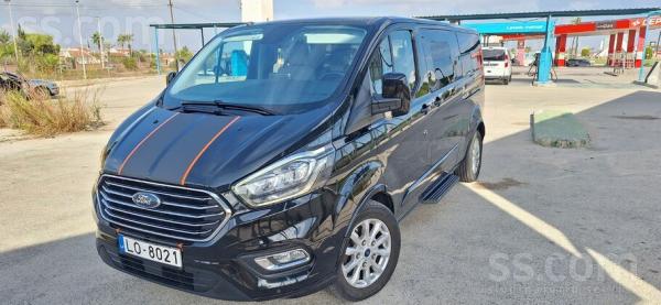 Black Ford Tourneo 2018 in Kuldiga, with an engine capacity of 2.00 L and mileage of 122 thousand km for 23500 €, photo 3 on AUTOMOTO.COM.LV