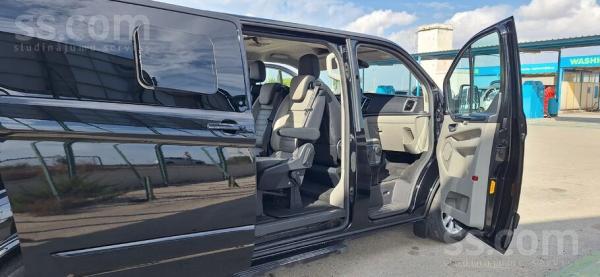 Black Ford Tourneo 2018 in Kuldiga, with an engine capacity of 2.00 L and mileage of 122 thousand km for 23500 €, photo 6 on AUTOMOTO.COM.LV
