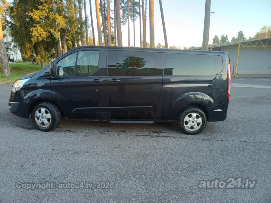 Black Ford Tourneo 2015 in Tallinn, with an engine capacity of 2.20 L and mileage of 249 thousand km for 13900 €, photo 5 on AUTOMOTO.COM.LV