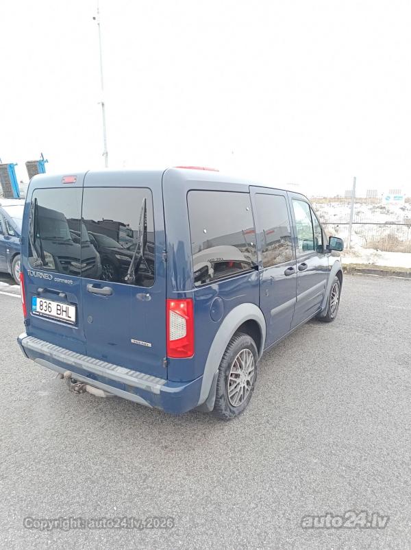 Blue Ford Tourneo 2012 in Tallinn, with an engine capacity of 1.80 L and mileage of 188 thousand km for 2999 €, photo 5 on AUTOMOTO.COM.LV