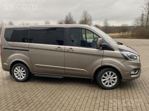 Brown Ford Tourneo 2018 in Tukums, with an engine capacity of 2.00 L and mileage of 131 thousand km for 20900 €, photo 4 on AUTOMOTO.COM.LV