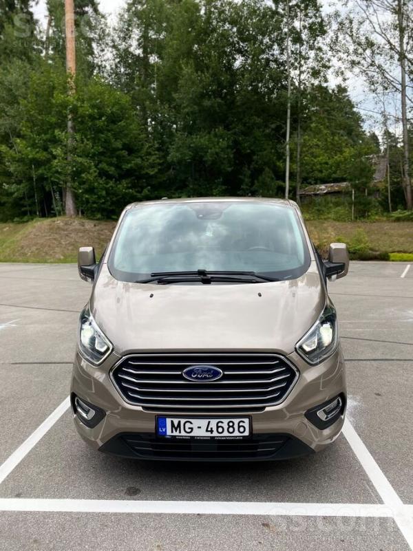 Brown Ford Tourneo 2019 in Ogre, with an engine capacity of 2.00 L and mileage of 71 thousand km for 21600 €, photo 3 on AUTOMOTO.COM.LV