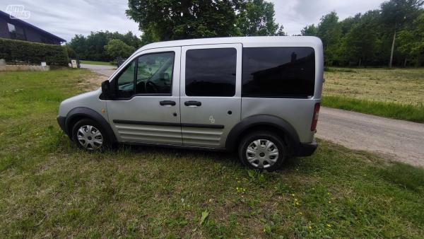Grey Ford tourneo-connect 2005 in Kaunas, with an engine capacity of 1.80 L and mileage of 239 thousand km for 1050 €, photo 7 on AUTOMOTO.COM.LV