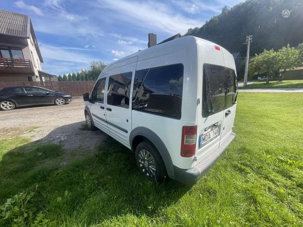White Ford tourneo-connect 2008 in Kaunas, with an engine capacity of 1.75 L and mileage of 255 thousand km for 3500 €, photo 4 on AUTOMOTO.COM.LV