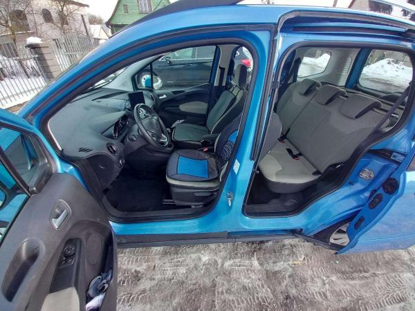 Blue Ford tourneo-courier 2015 in Kaunas, with an engine capacity of 1.50 L and mileage of 213 thousand km for 5790 €, photo 9 on AUTOMOTO.COM.LV
